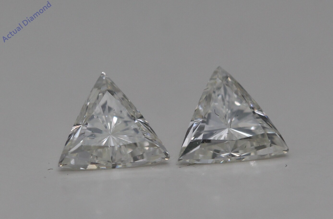 A Pair Of Triangle Cut Loose Diamonds (0.75 Ct,J Color,Vs1 Clarity)